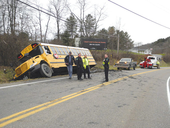 Malfunction lands bus in ditch | News, Sports, Jobs - The Review